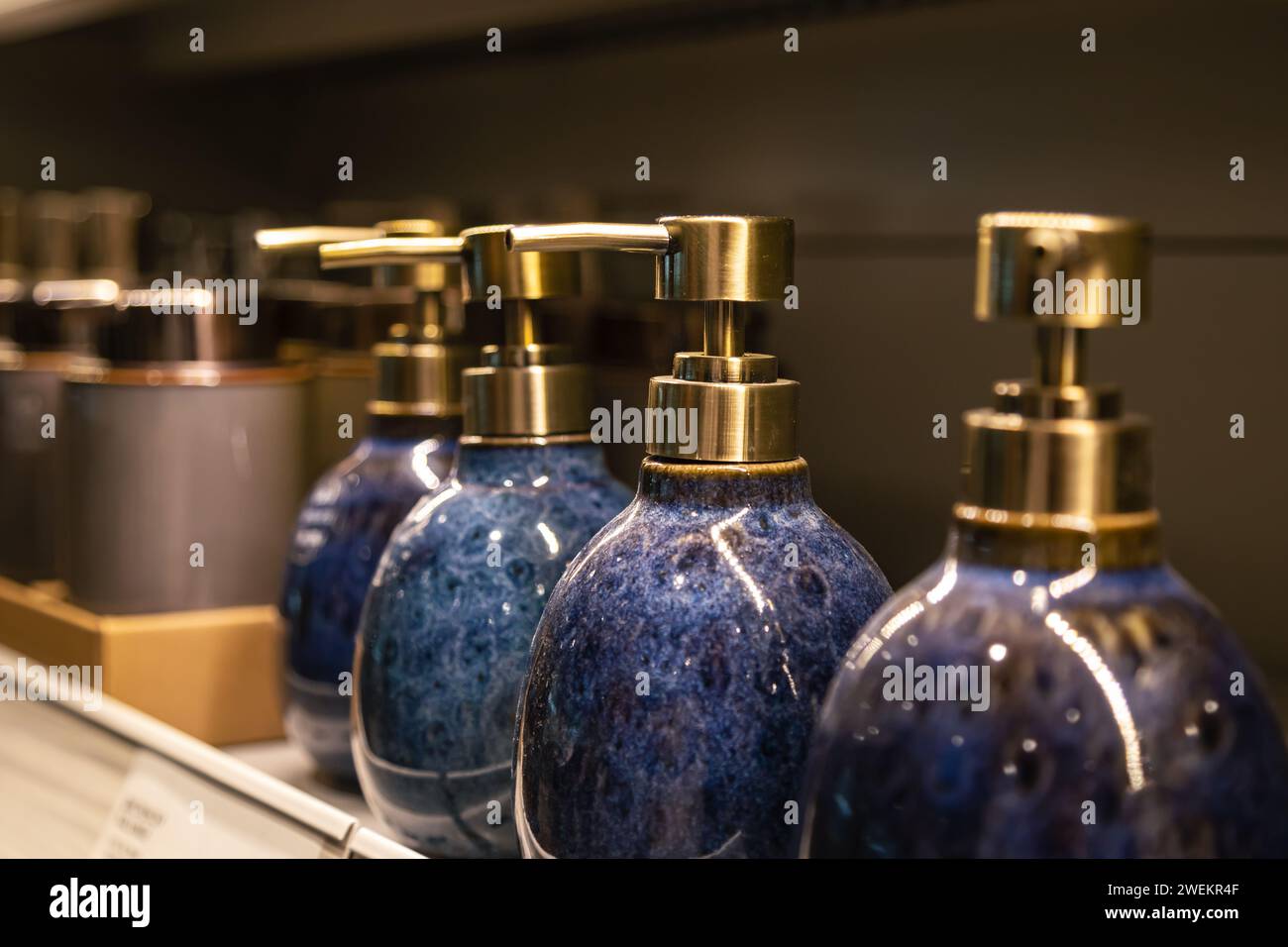 Containers for liquid soap or shampoo with a dispenser is sold in a ...