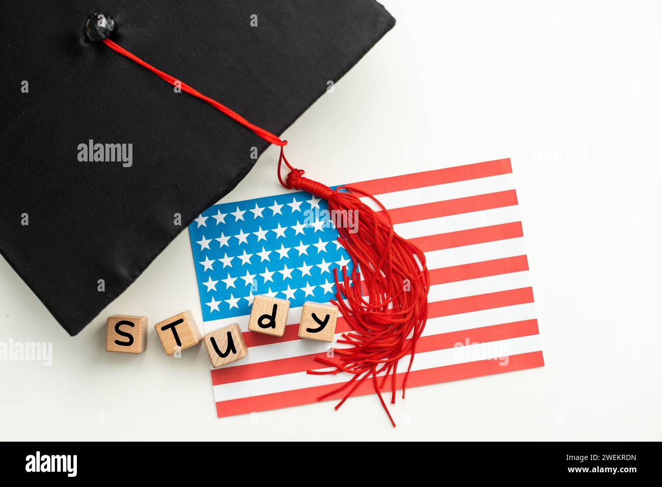 graduation hat on US flag, education concept Stock Photo - Alamy