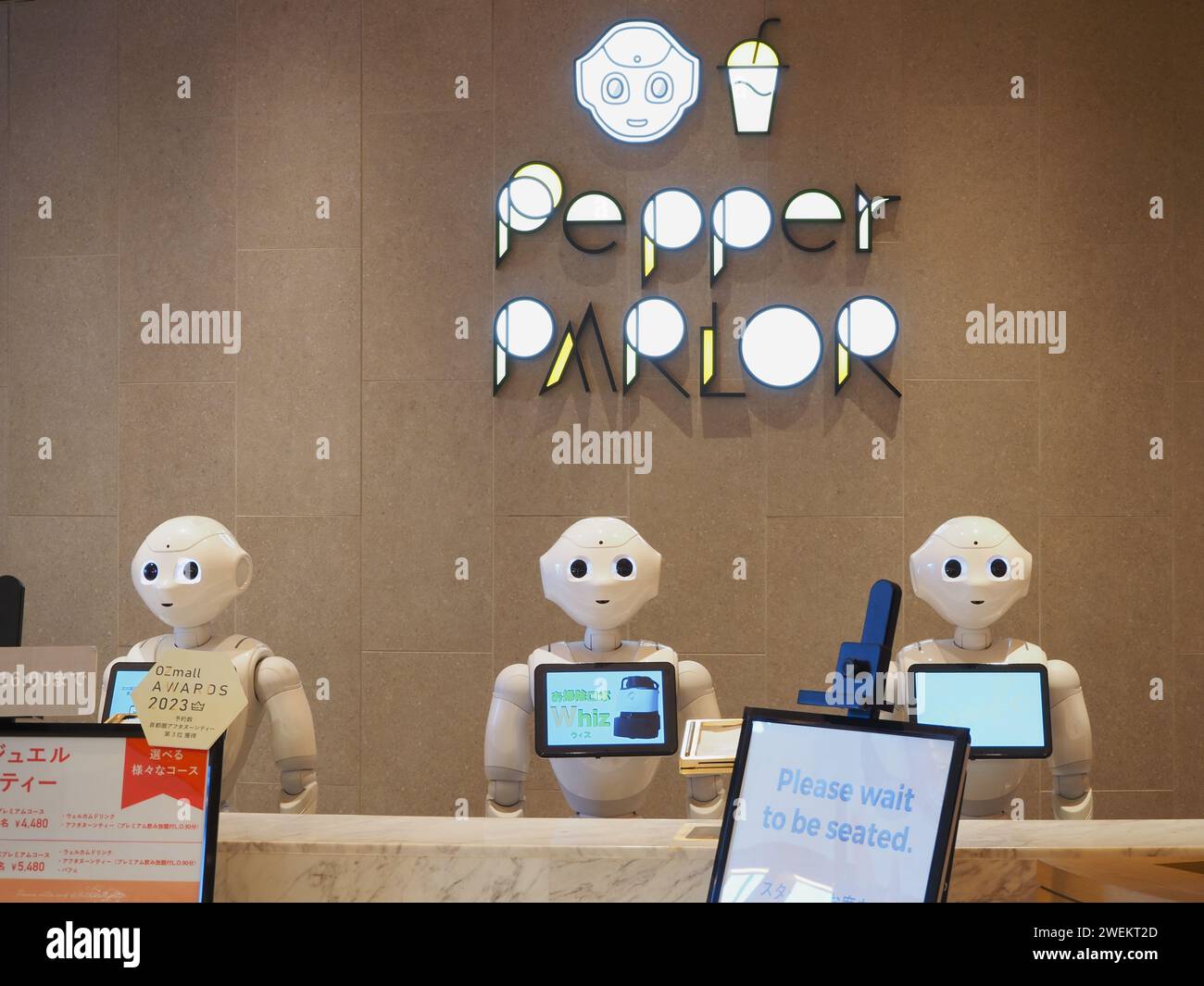 TOKYO, JAPAN - January 26, 2024: Pepper robots at a counter in Pepper ...