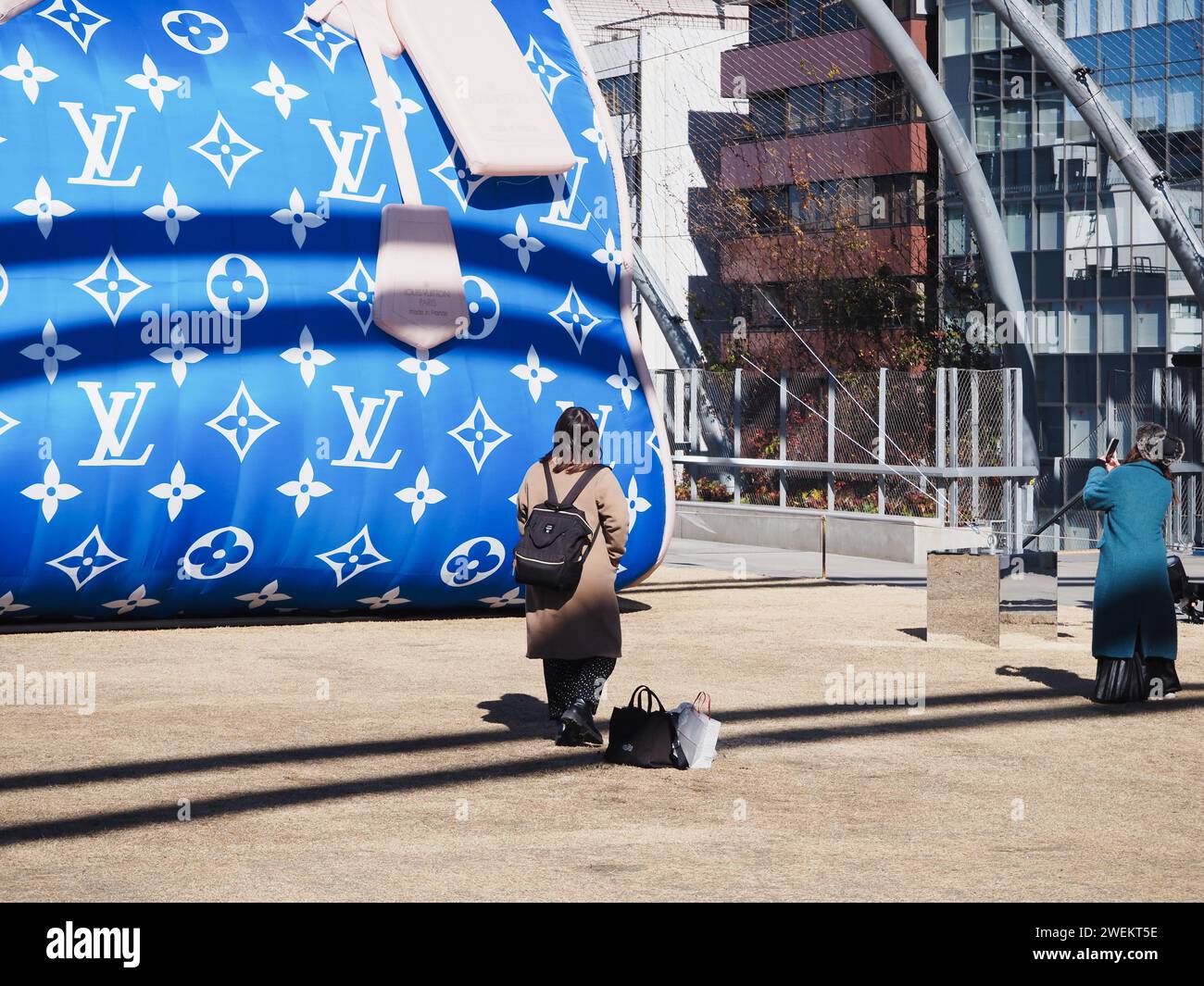 TOKYO, JAPAN - January 26, 2024: A giant inflatable Louis Vuitton bag ...
