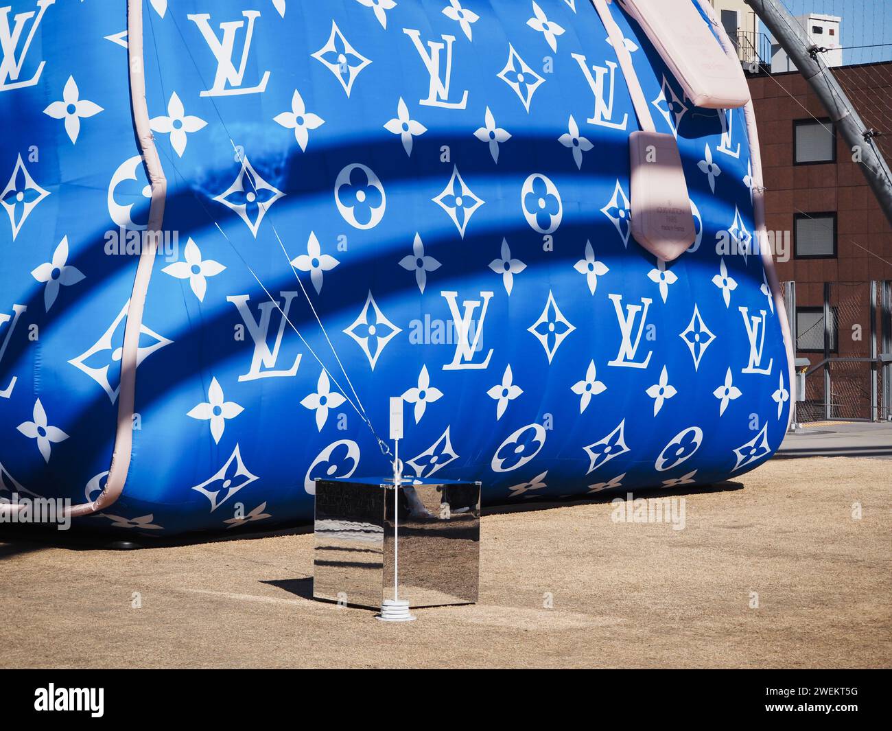 TOKYO, JAPAN - January 26, 2024: A giant inflatable Louis Vuitton bag ...