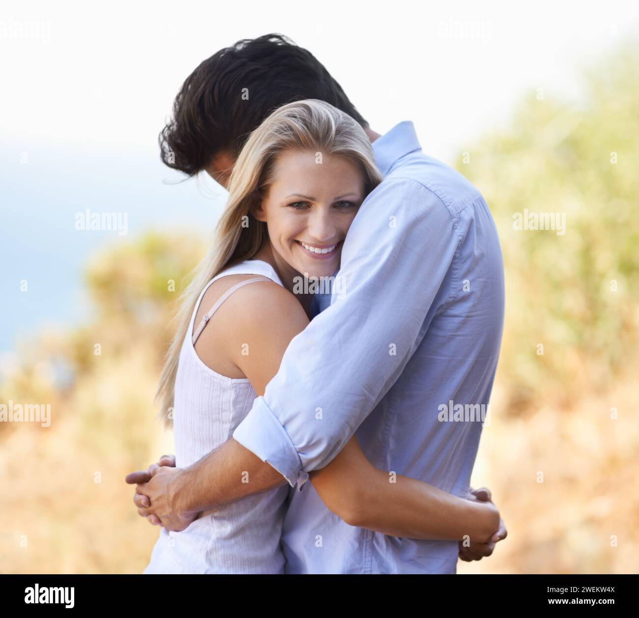 Happy woman, love and portrait of couple hug for support, romantic care ...