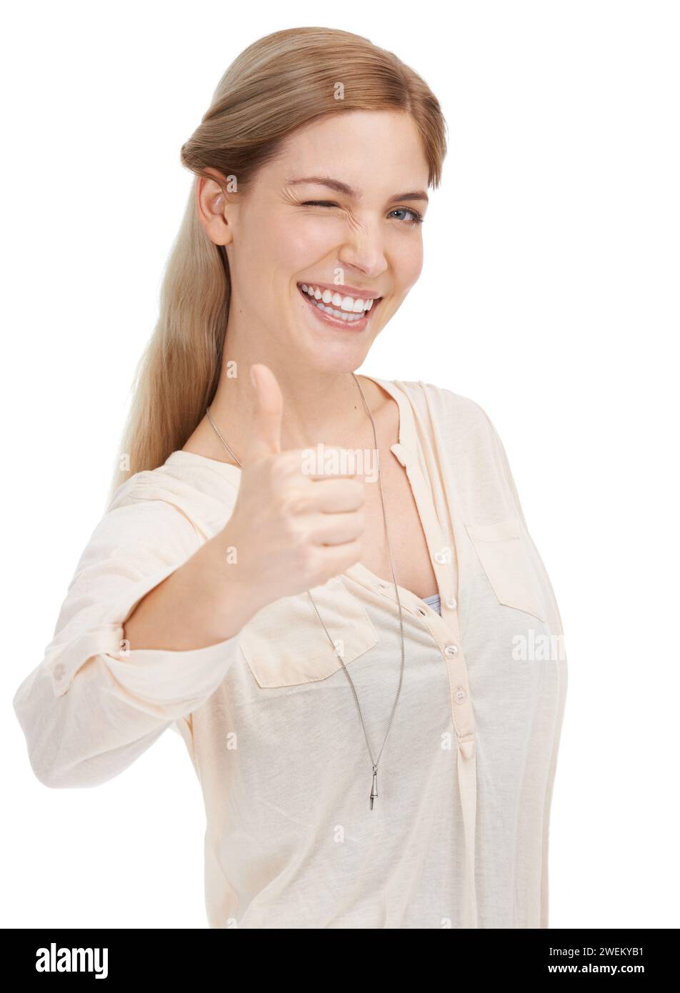 Portrait, happy woman and wink with thumbs up in studio for support ...