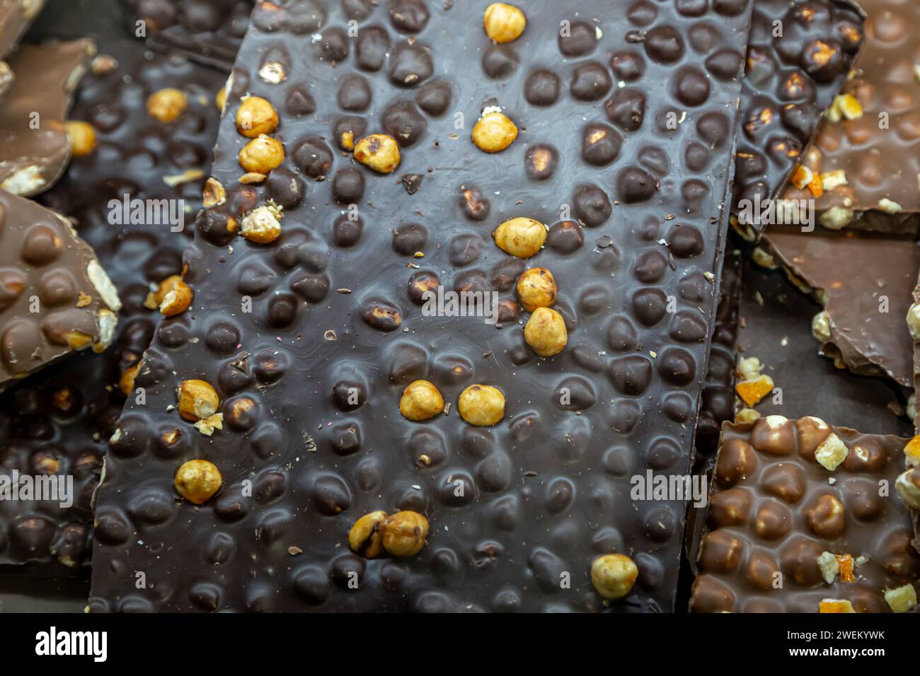 Chocolate bars with nuts close-up on a store window Stock Photo - Alamy