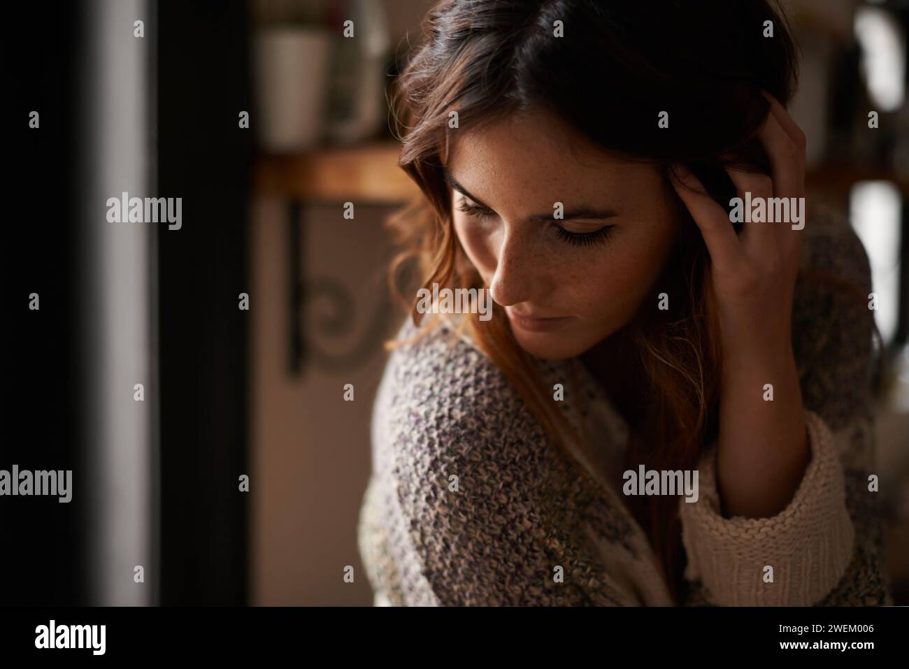 Lonely, depression and young woman at a home with upset, grief and mad ...