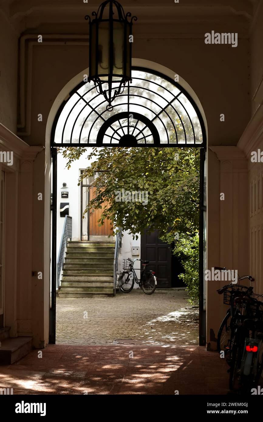 Copenhagen, Denmark - August 17, 2023: cosy courtyard of a house with ...