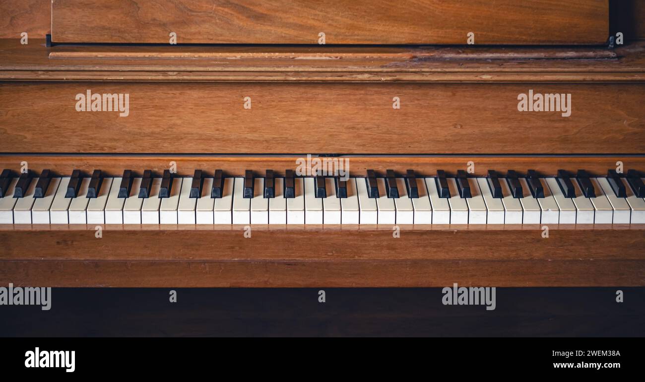 Piano keys on wooden brown musical instrument Stock Photo - Alamy