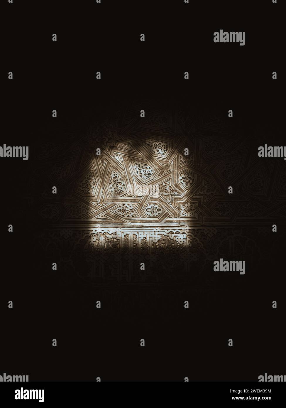 Sunlight coming through an engraved window of a famous Arabian palace ...