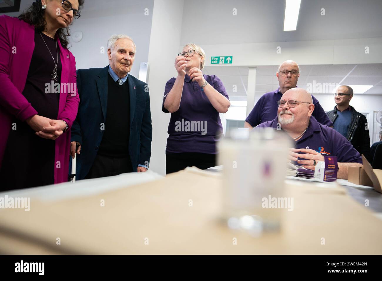 Holocaust survivor Steven Frank (second left) and a survivor of a ...
