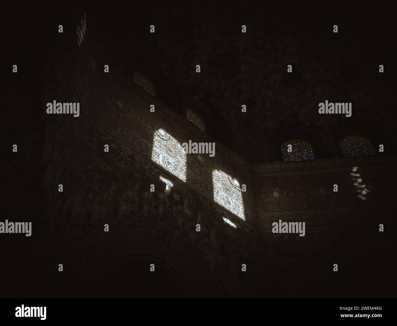 Sunlight coming through an engraved window of a famous Arabian palace ...