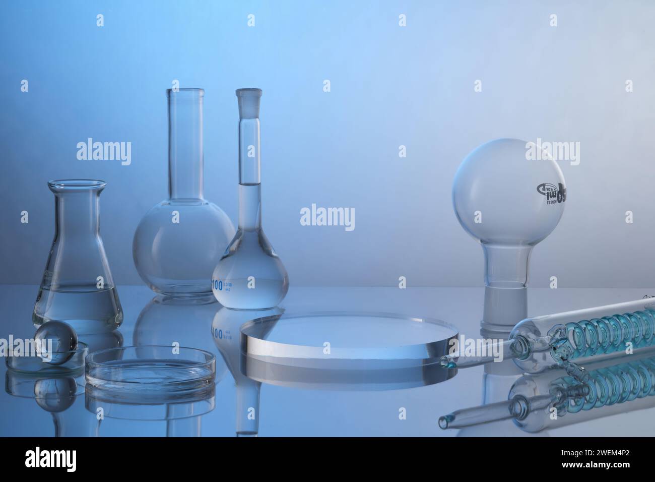Laboratory glass equipment with transparent water ingredients on color ...
