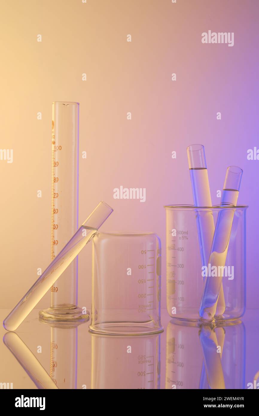 Vertical frame with laboratory equipment - beaker and test tubes ...