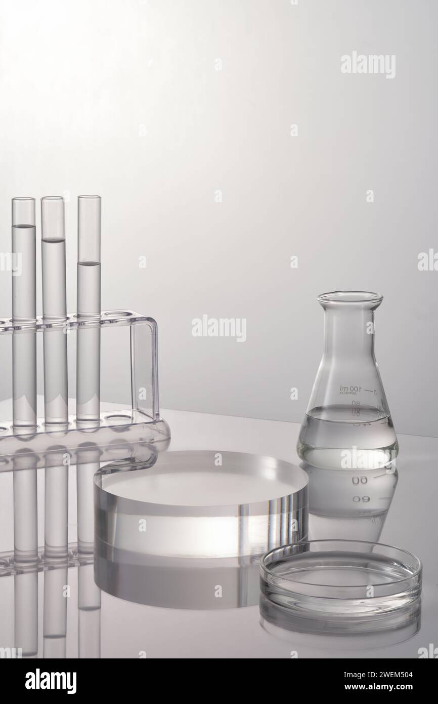 Lab theme with lab glassware and transparent podium on white background ...