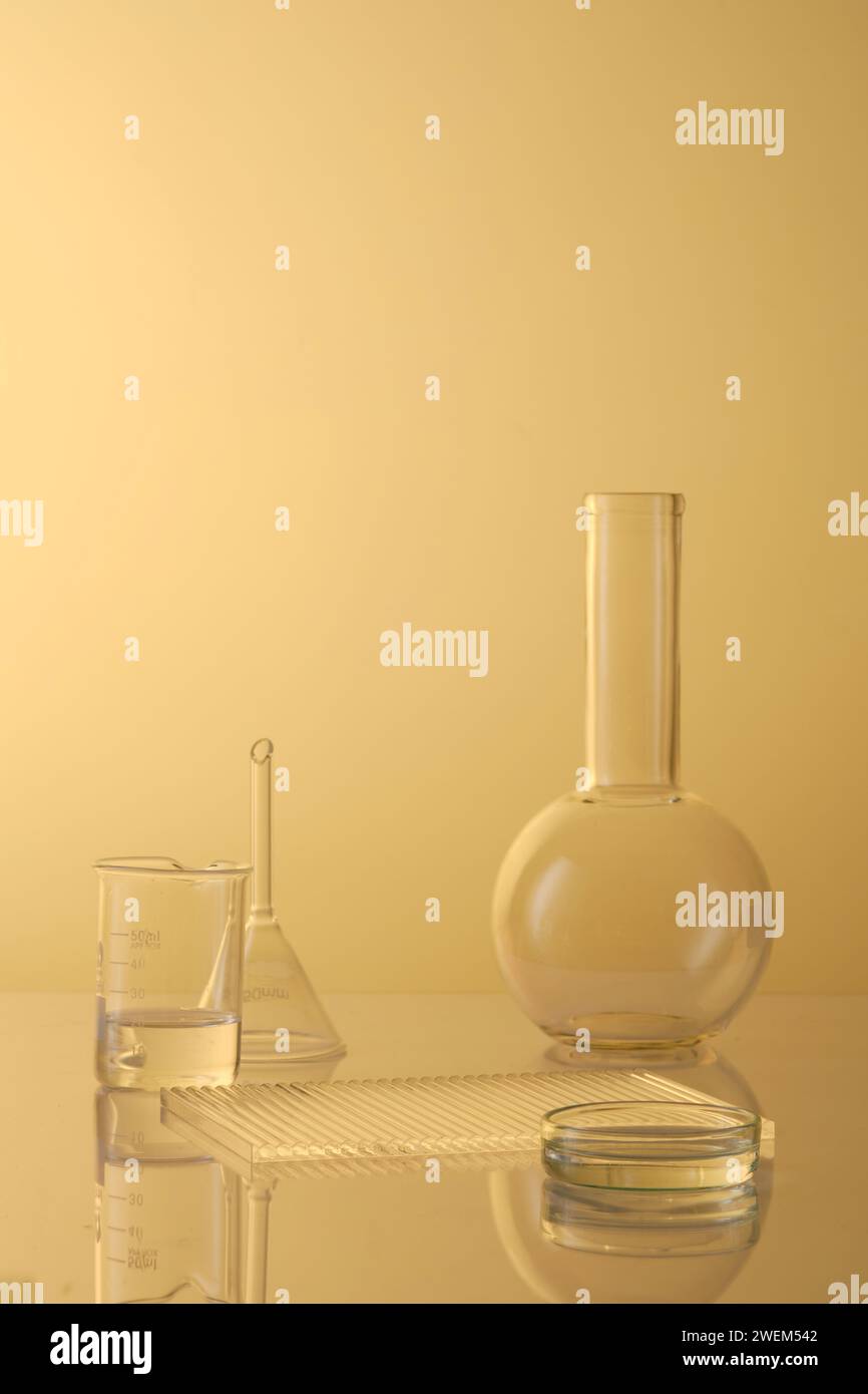 Minimal art background with lab glassware containing transparent liquid ...