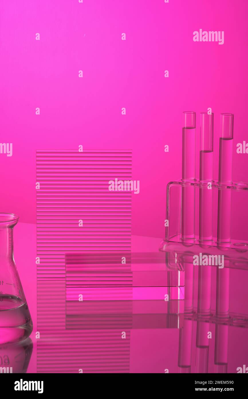 Laboratory glassware containing transparent liquid inside and ribbed ...