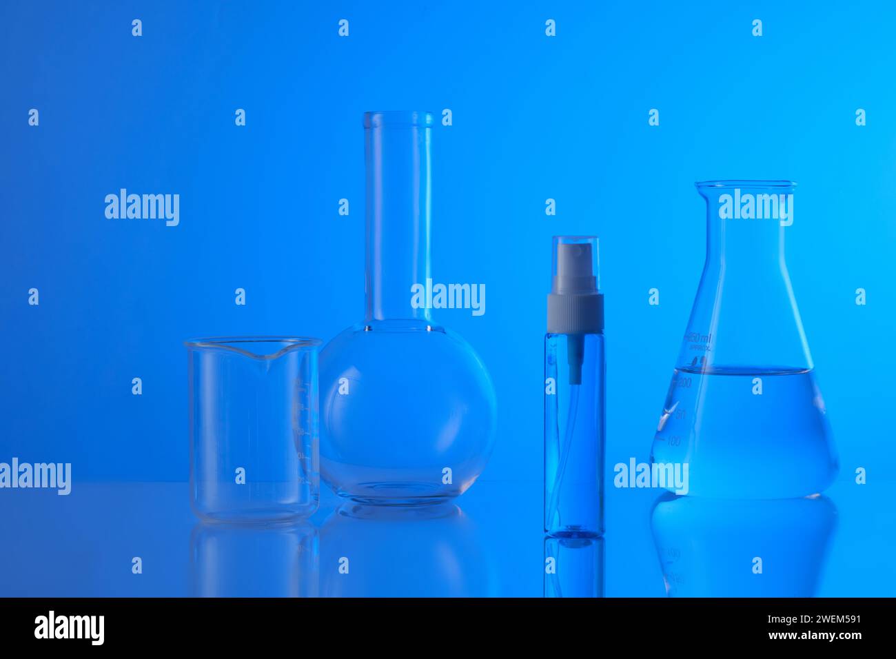 Laboratory Equipment And Science Content With Boiling Flask Erlenmeyer Flask Filled Colorless