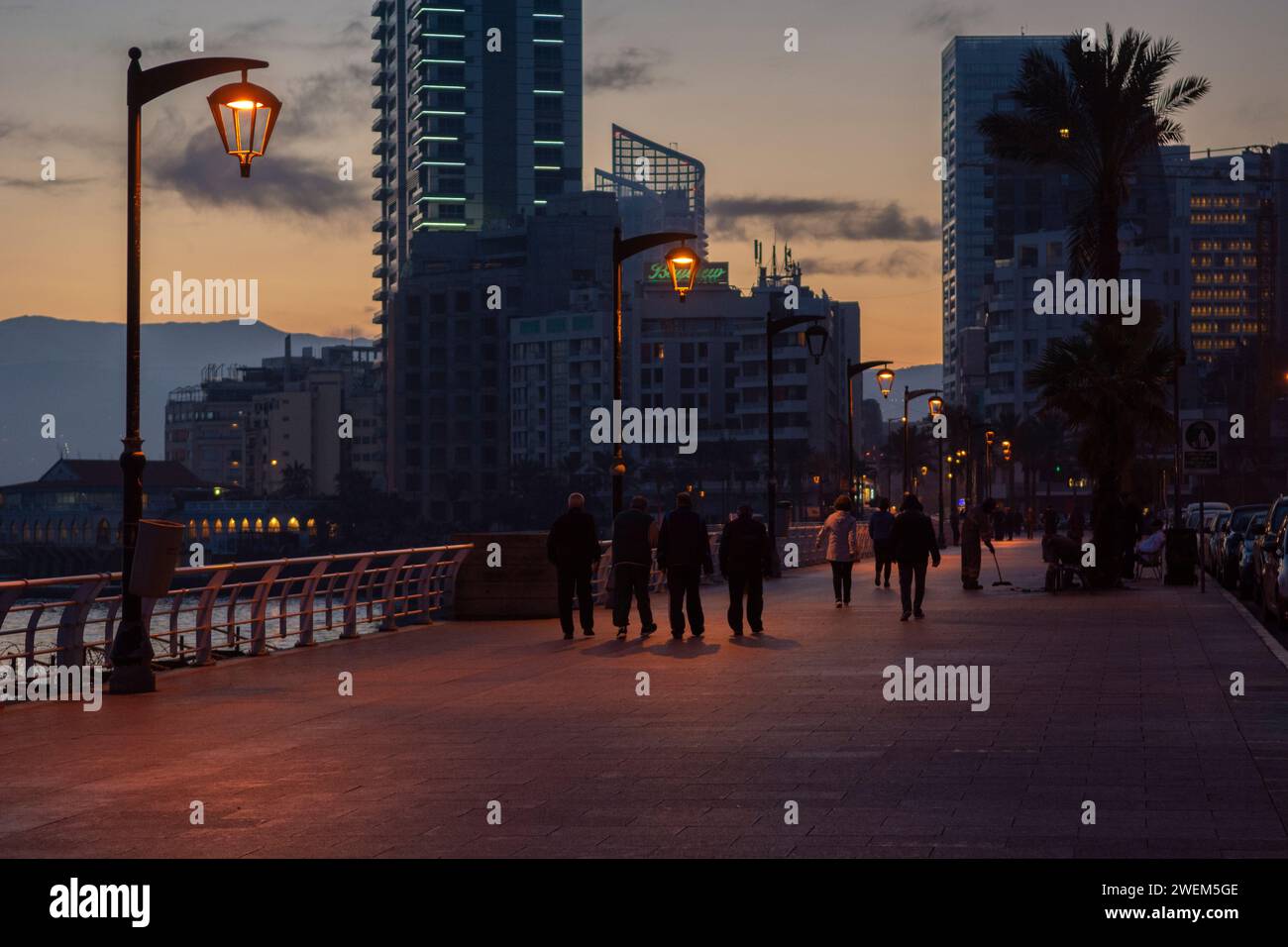People walking the promenade at sunset Beirut Lebanon Middle East Stock ...
