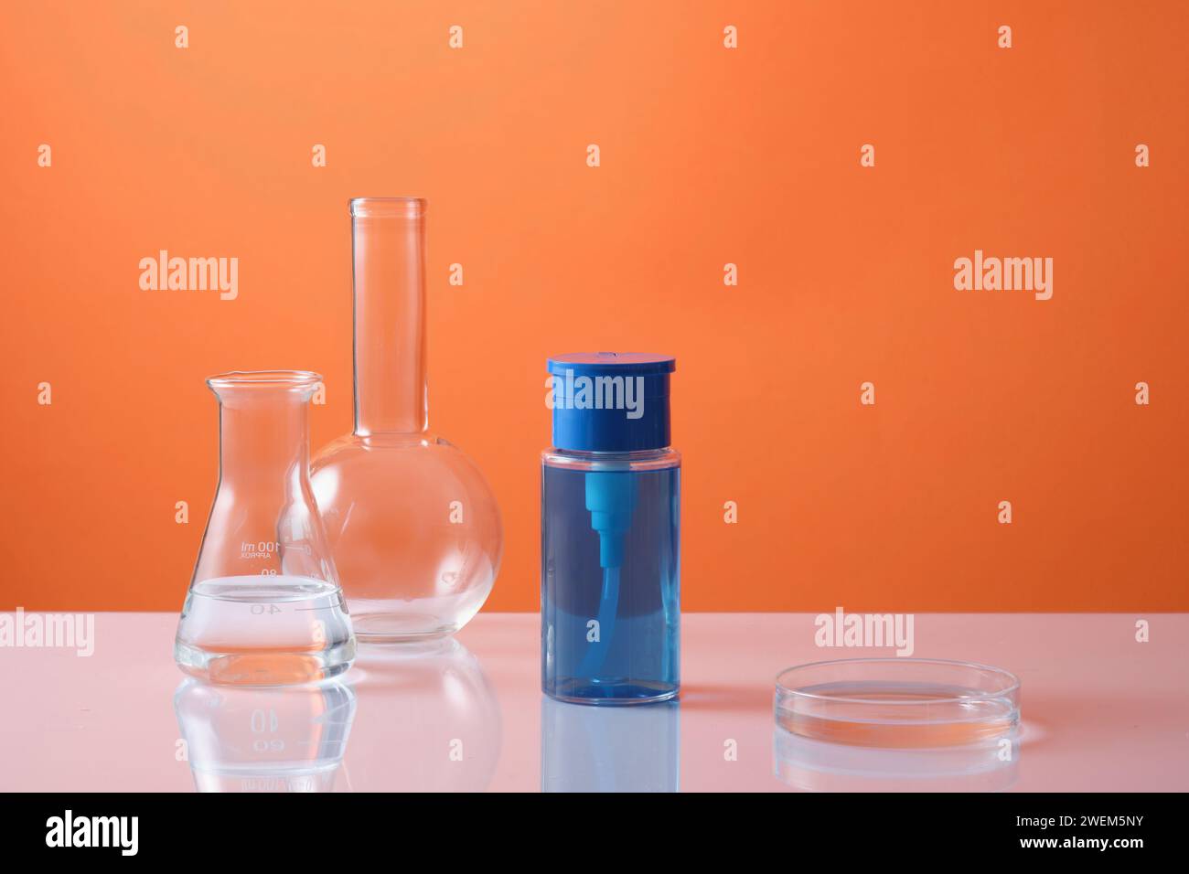 Front view of blue push down pump dispenser bottle unlabeled and ...