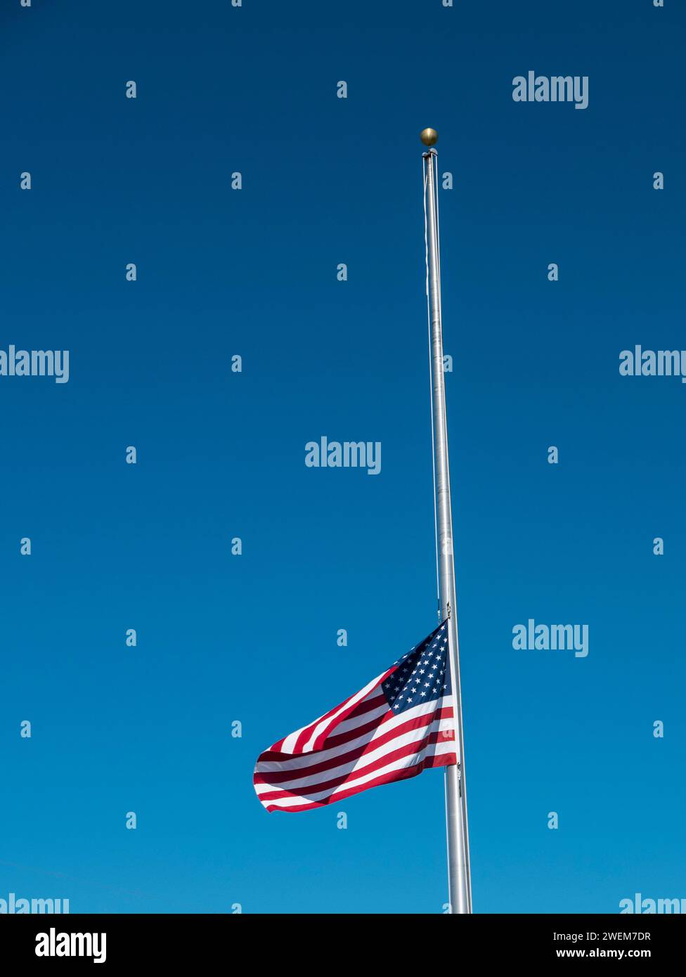 American Flag Flying at Half Mast Stock Photo - Alamy