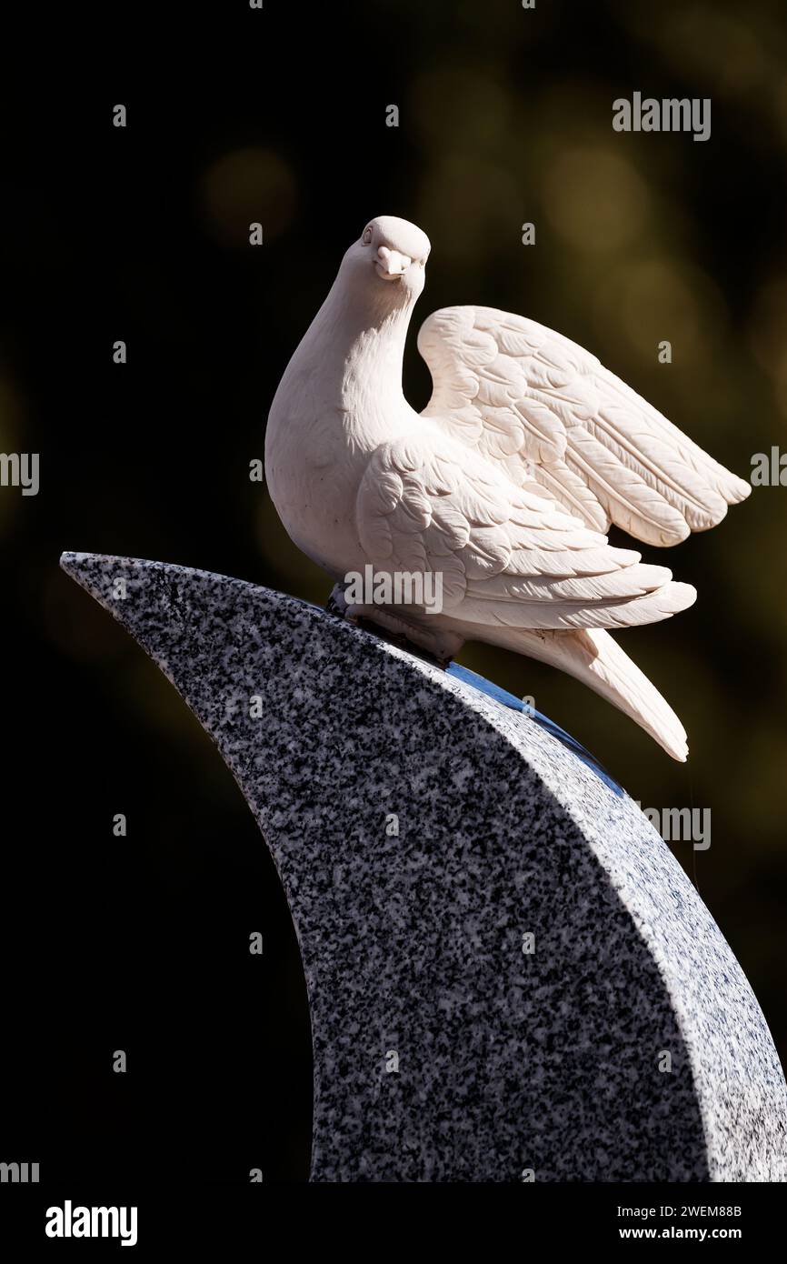 Statue of a dove in the Alhambra cemetery Stock Photo - Alamy