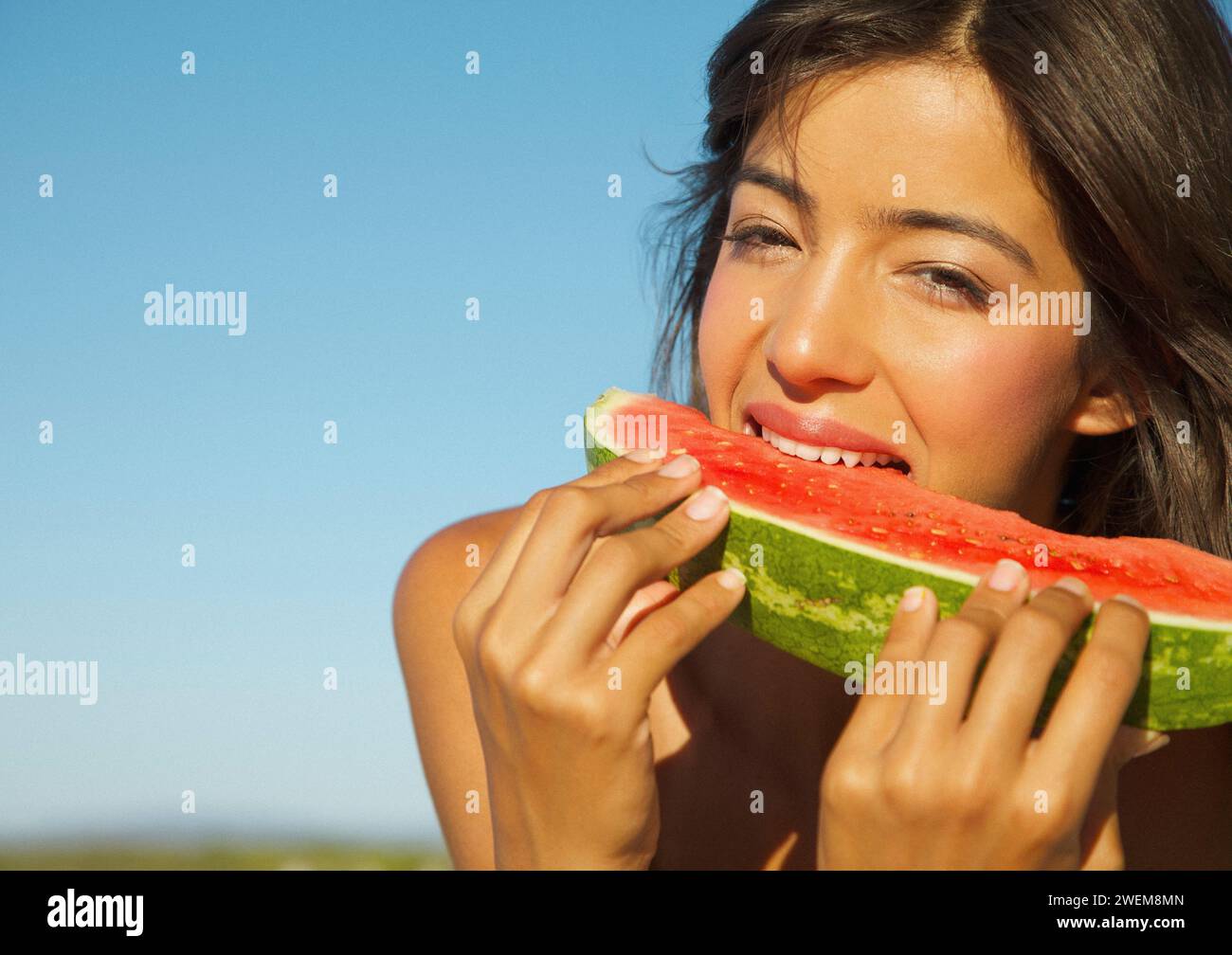 Young Woman Eating Watermelon Stock Photo - Alamy