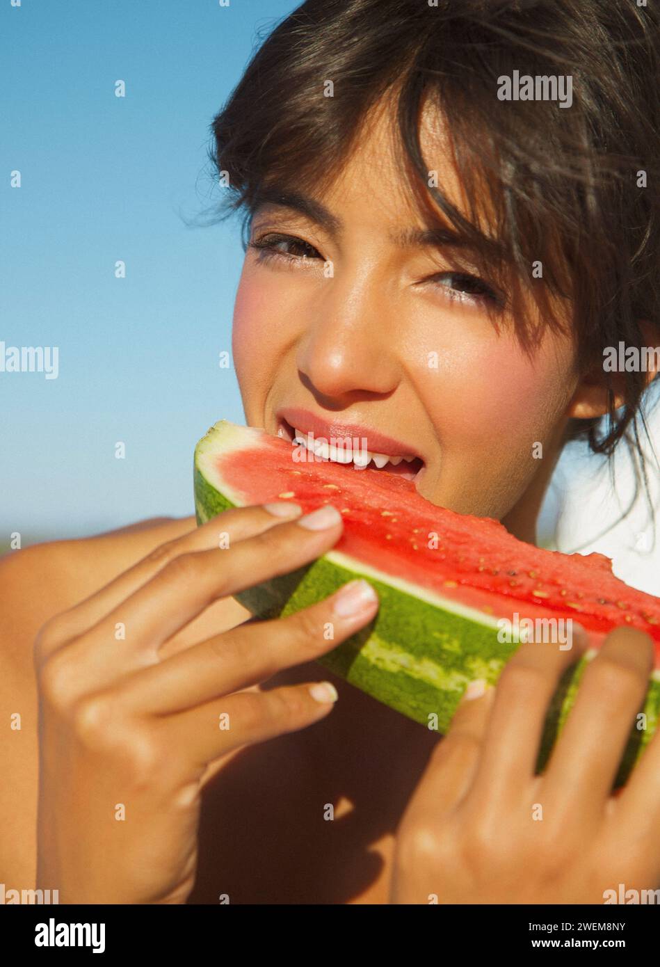Young Woman Eating Watermelon Stock Photo - Alamy
