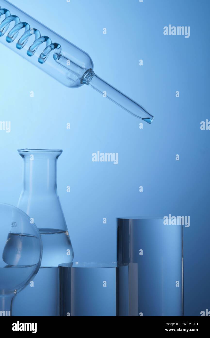 Front view of laboratory equipment filled transparent solution and ...