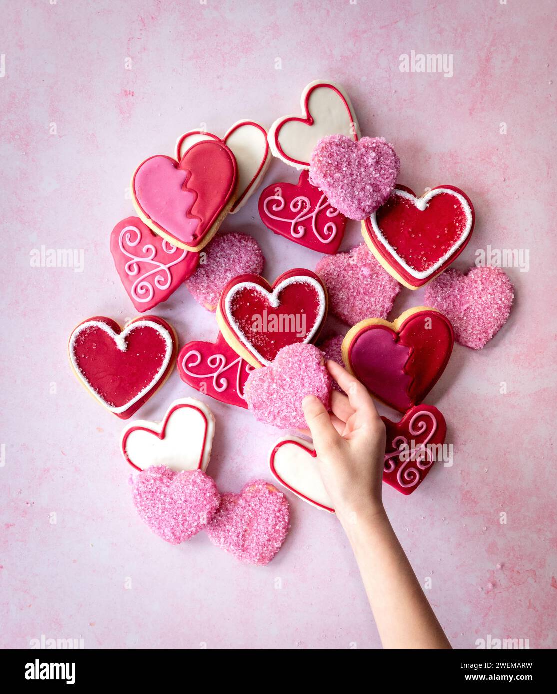 Child sneaking cookie hi-res stock photography and images - Alamy