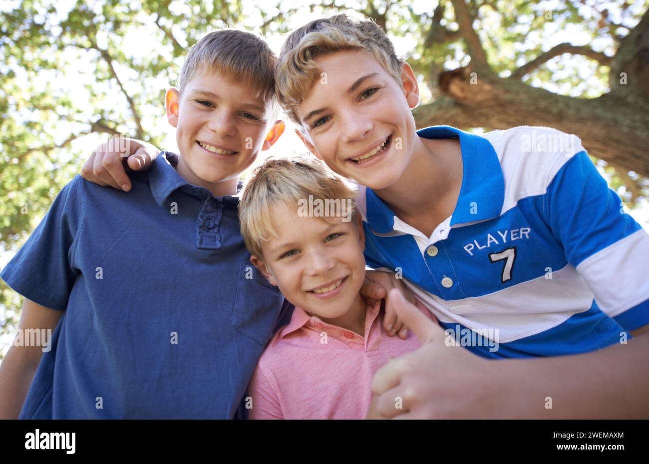 Friends, brothers and hugging in outdoor portrait, children and care in ...