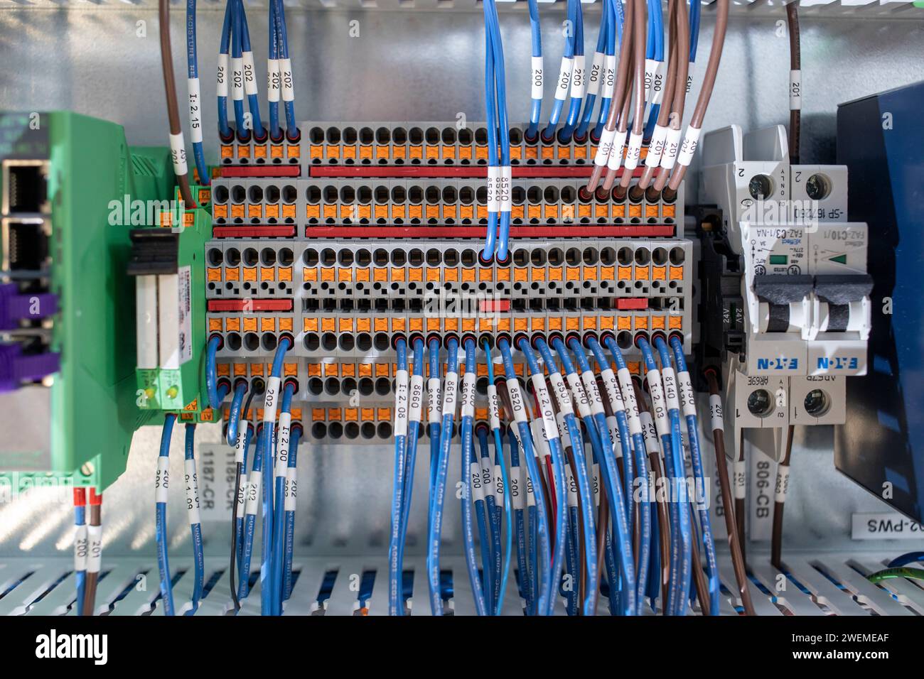 Multiple wires plugged into electronic terminal junction Stock Photo ...