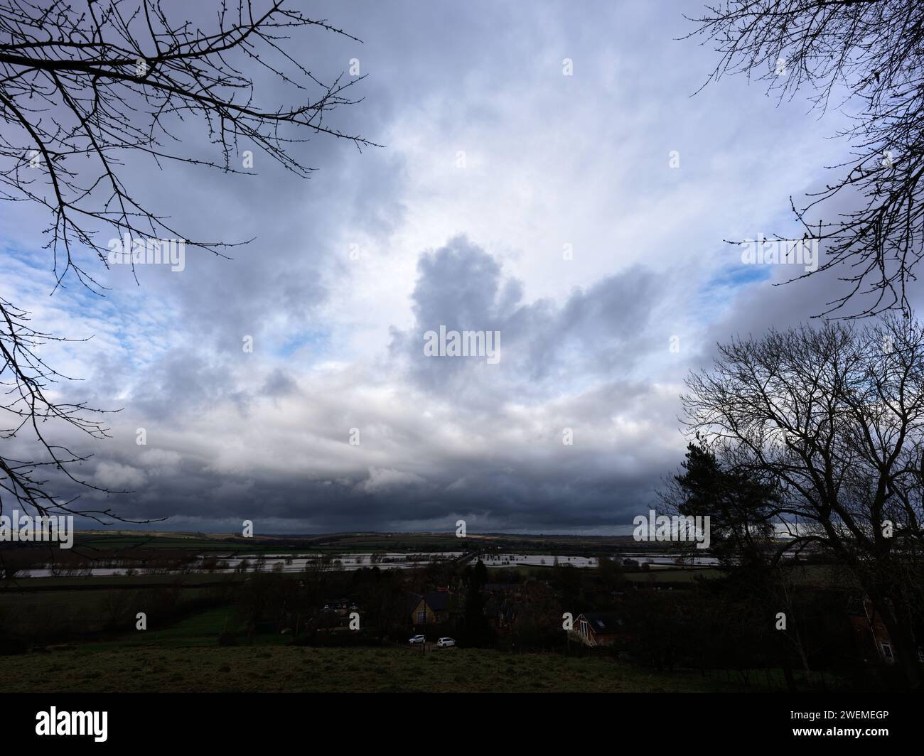 Storm cloud over a flooded Welland valley between the english villages ...