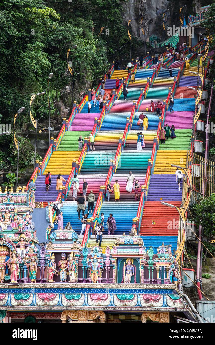 Visitors at colorful iconic staircases of Batu Cave Stock Photo - Alamy