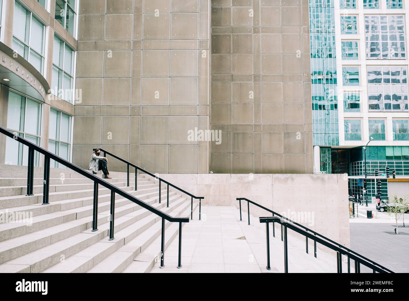 Person on steps hi-res stock photography and images - Alamy