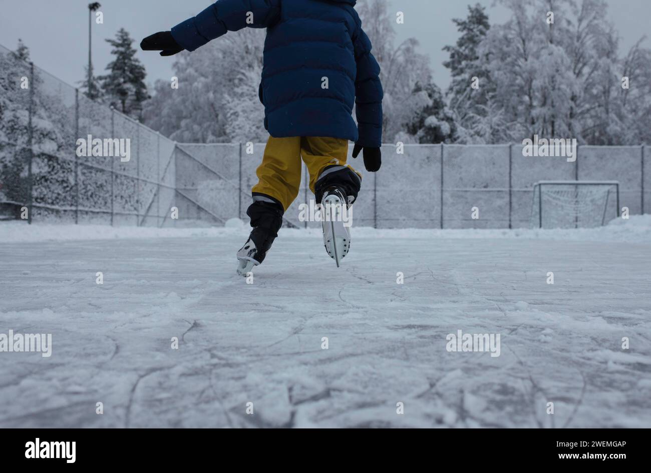 child ice skating in an outdoor ice rink in Stockholm Stock Photo - Alamy