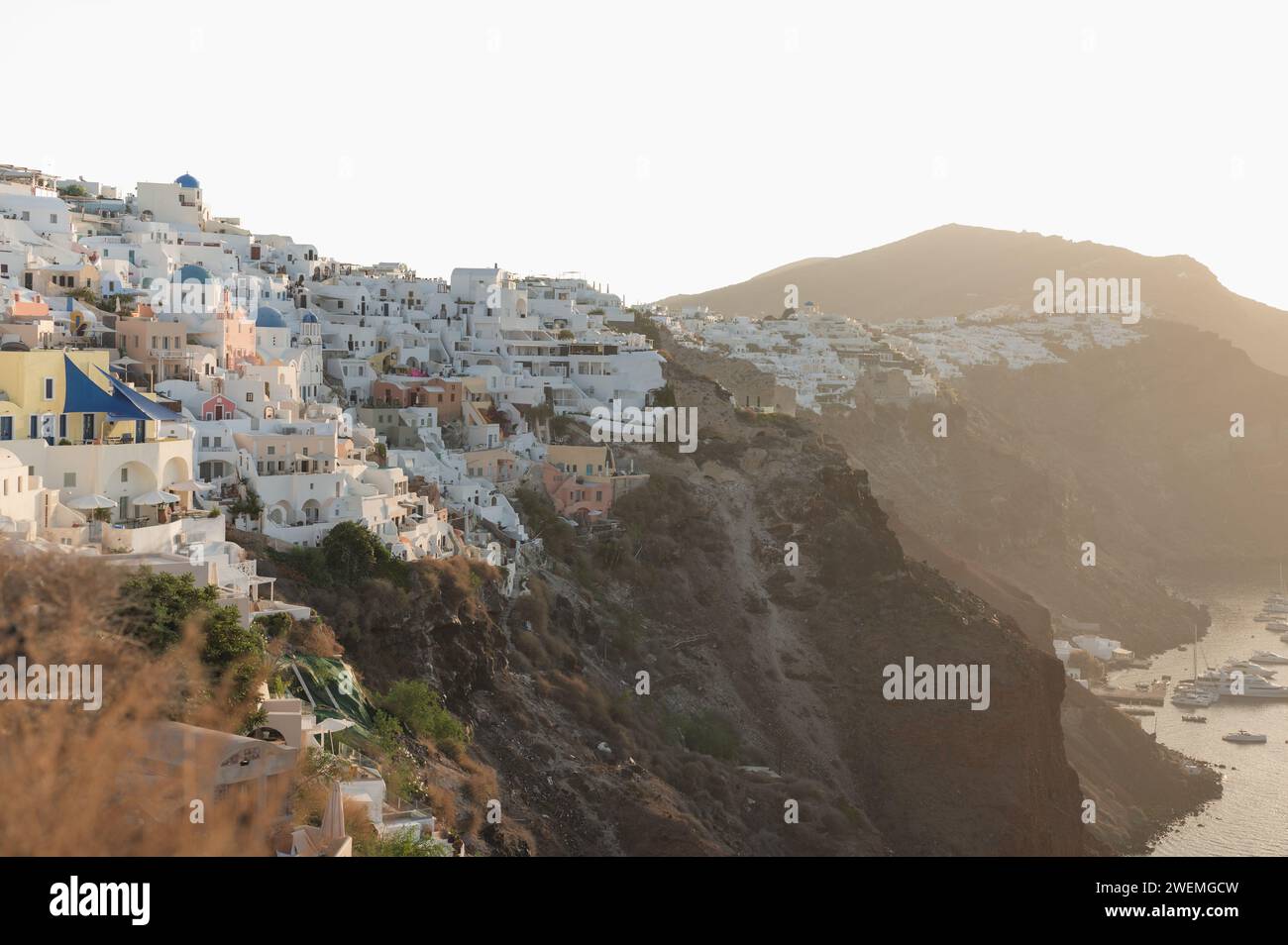 Morning light on the cityscape of Oia on the cliffs of Santorini Stock ...