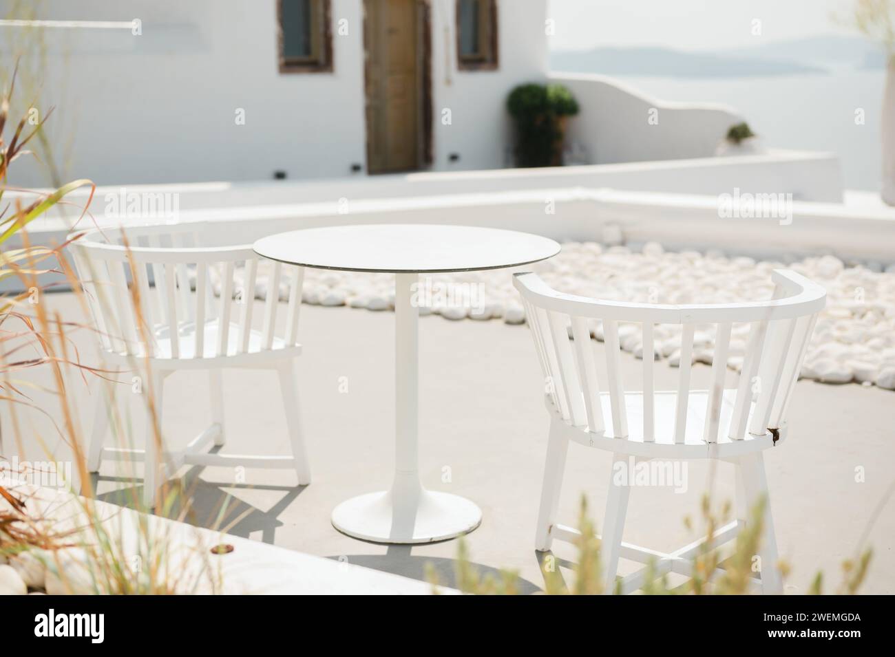 Greek style blue table chairs hi-res stock photography and images - Alamy