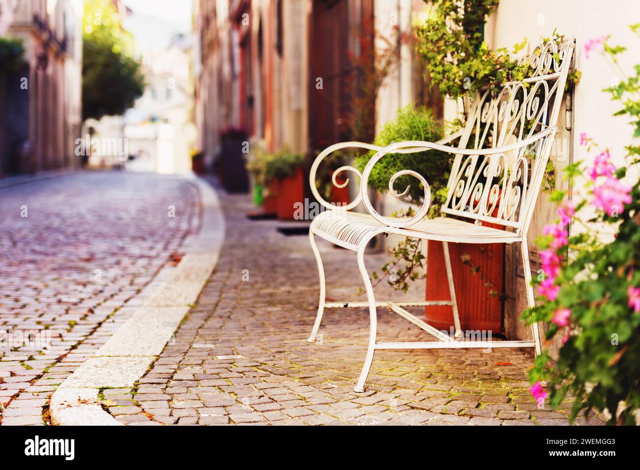 White iron bench in the old town of Lutry, Switzerland Stock Photo - Alamy