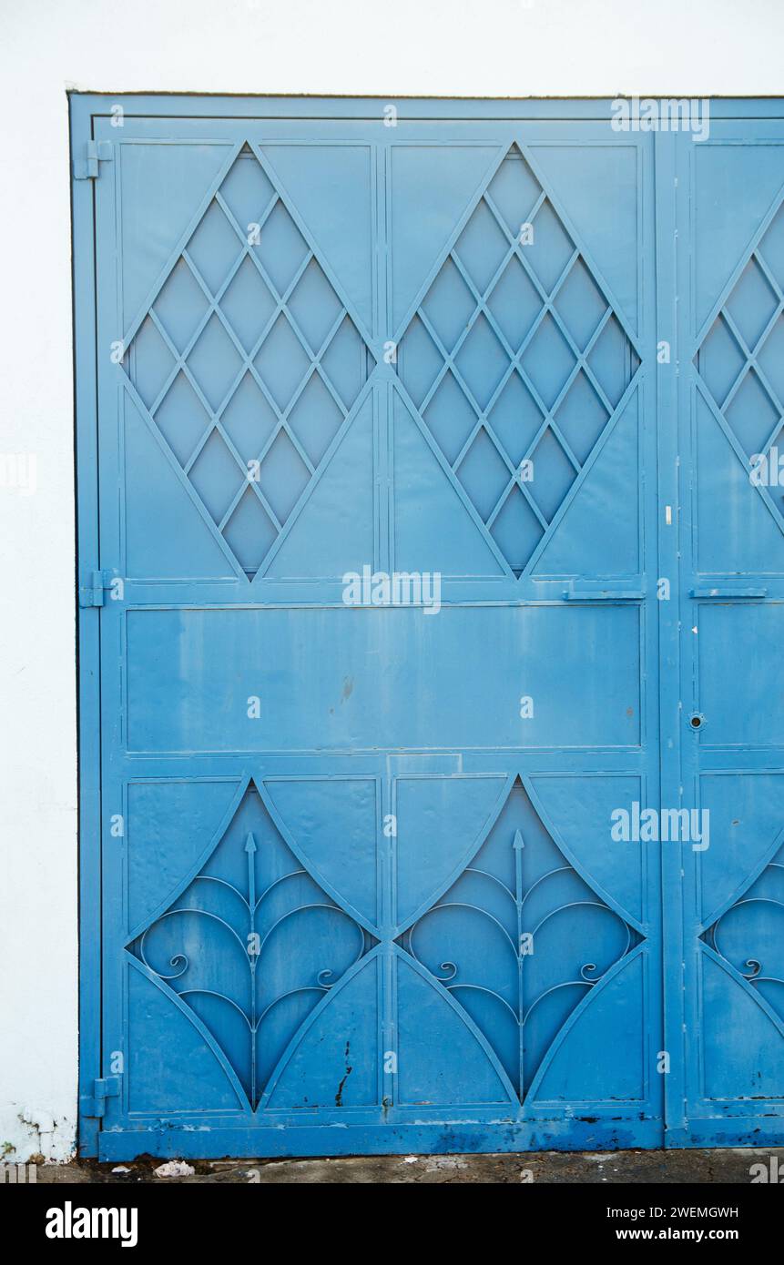 Geometric Metal Distressed Blue Door Stock Photo - Alamy