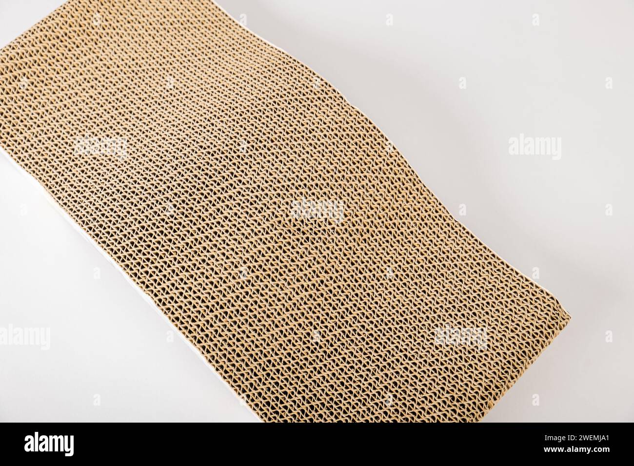 Modern cat scratching post also a lounge bed is crafted from corrugated ...