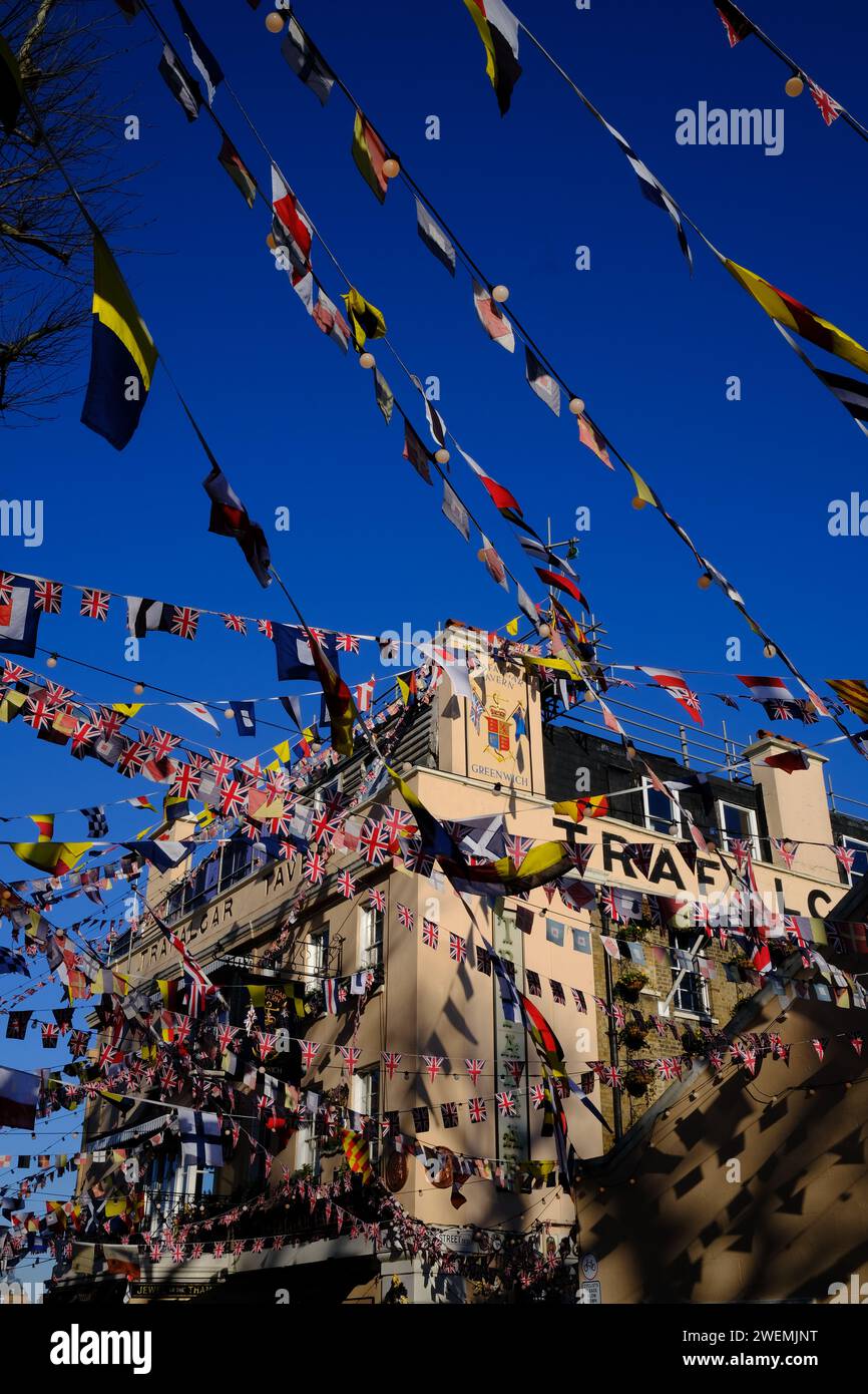Trafalgar Tavern in Greenwich with hundreds of flags/pennants flying in ...