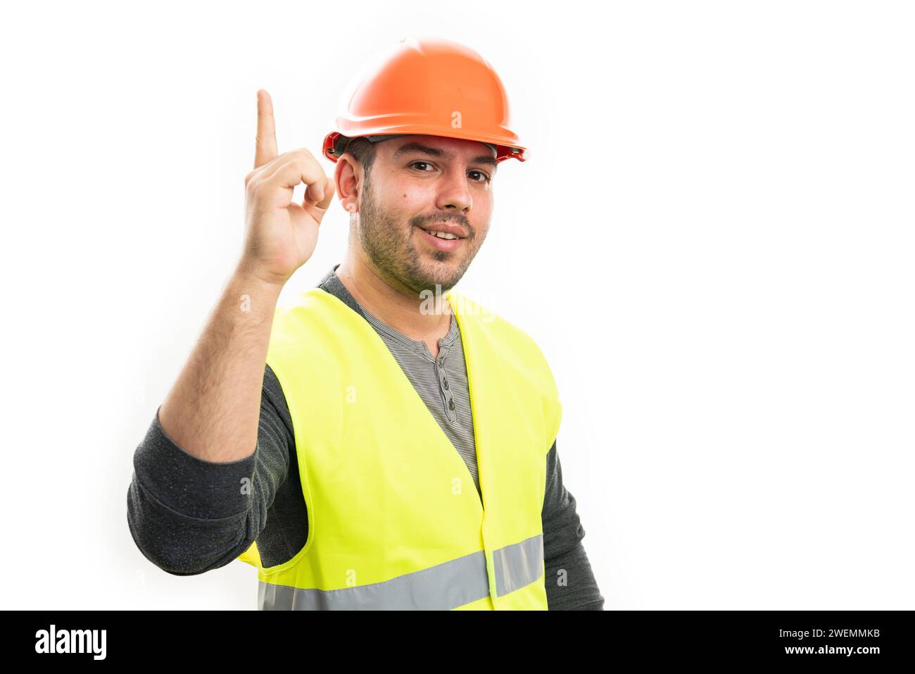 Happy cheerful adult constructor man making bright good idea gesture ...
