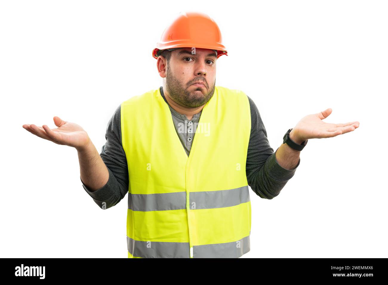 Confused constructor man wearing fluorescent vest and orange safety ...