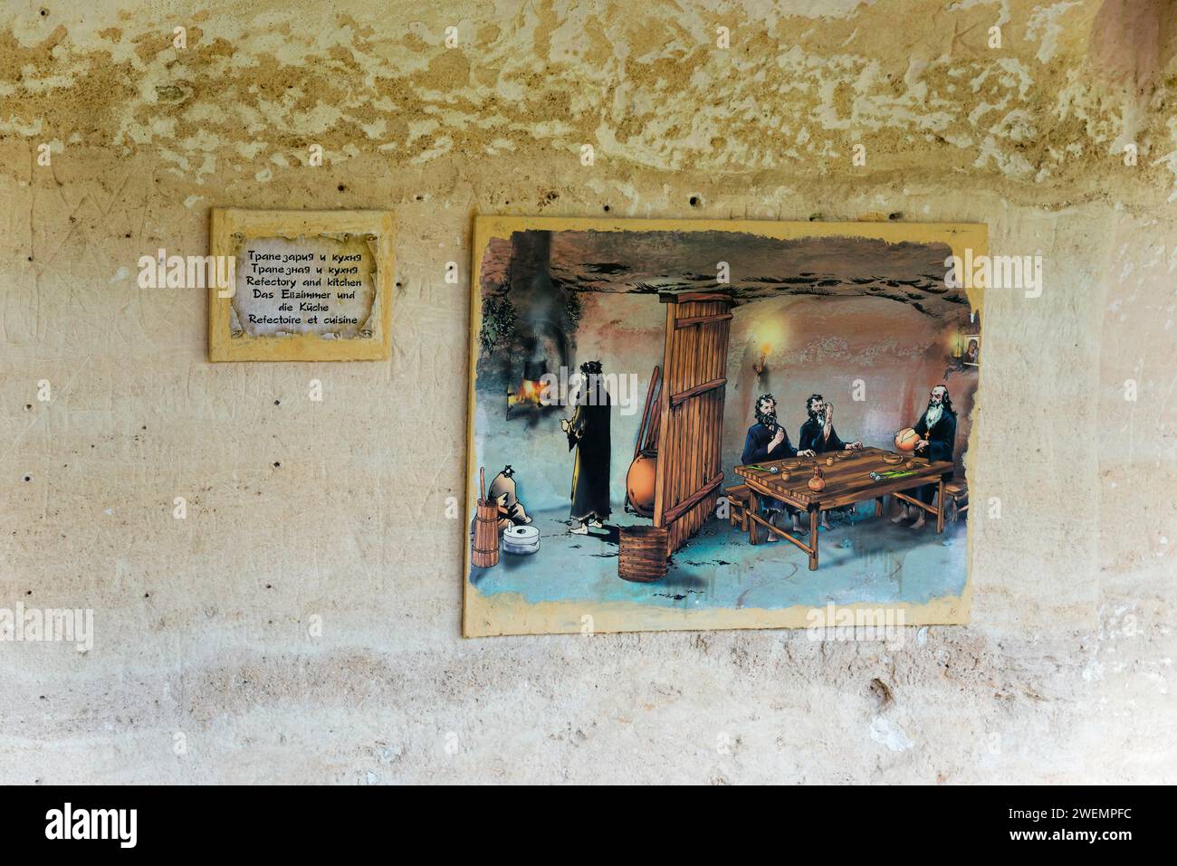 Mural of a historical scene with informative accompanying panel in a ...