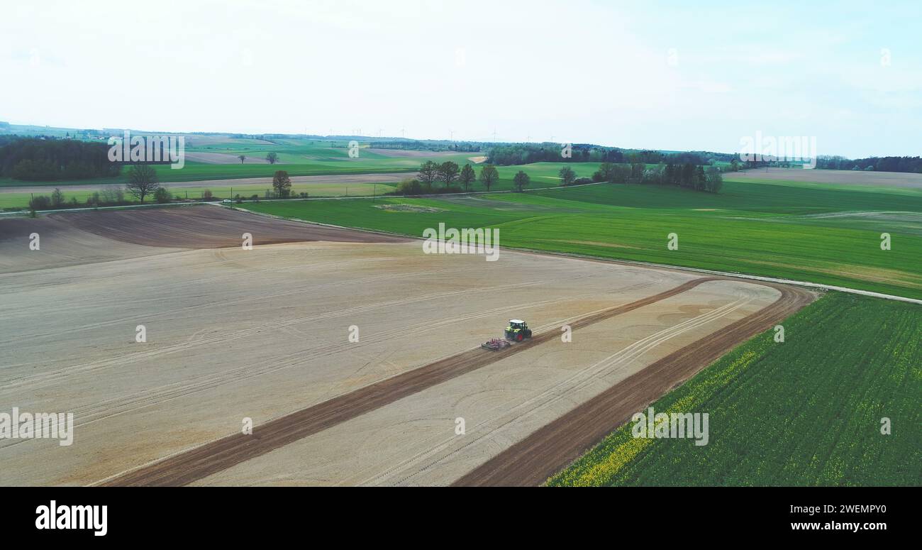 Selective tractor plowing soil hi-res stock photography and images - Alamy