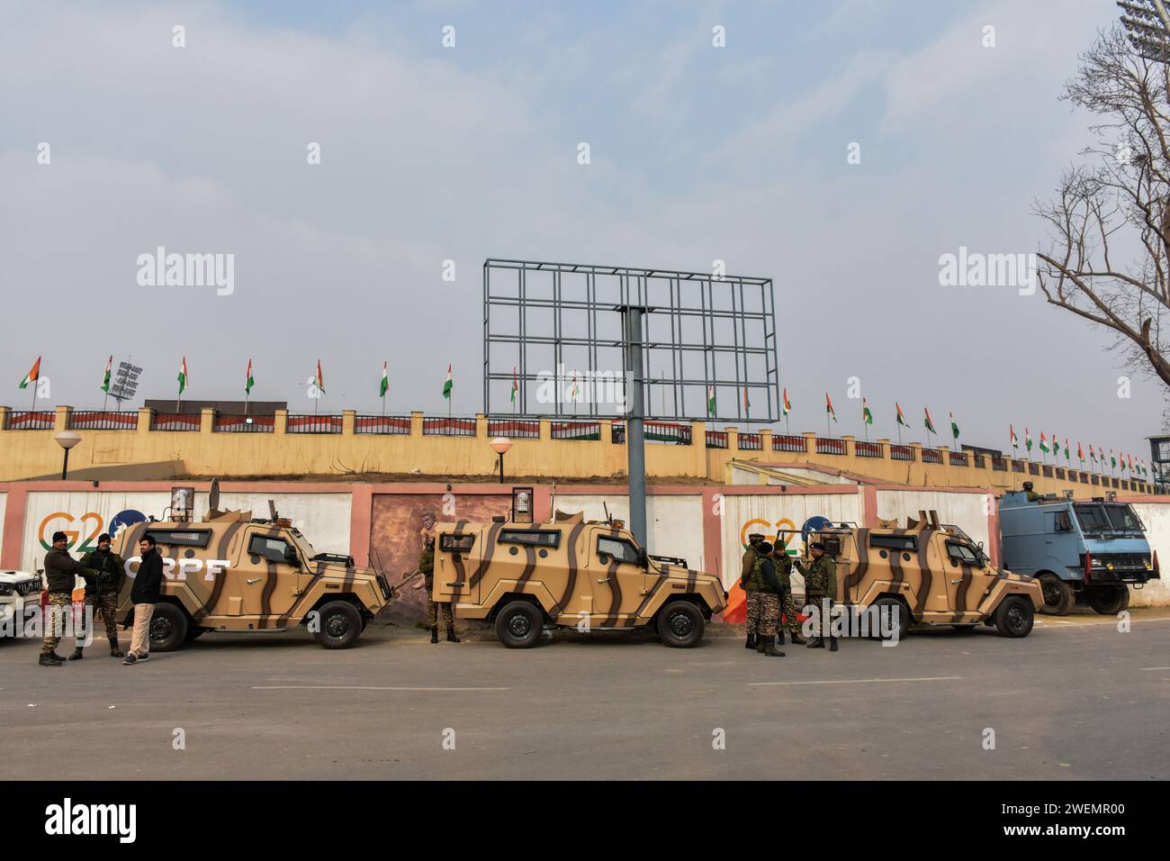 Government forces stand guard outside Bakshi Stadium, the main venue of ...