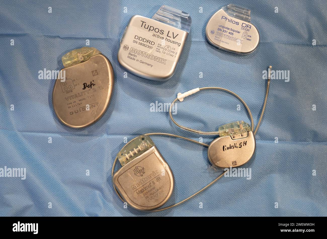 Dresden, Germany. 19th Jan, 2024. Various pacemakers lie on a table at ...