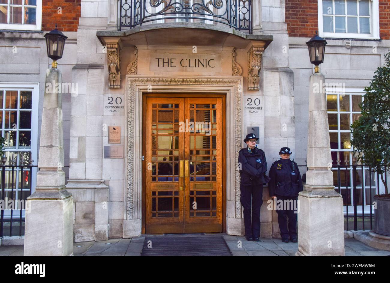 London, UK. 26th January 2024. Police officers stand outside the ...