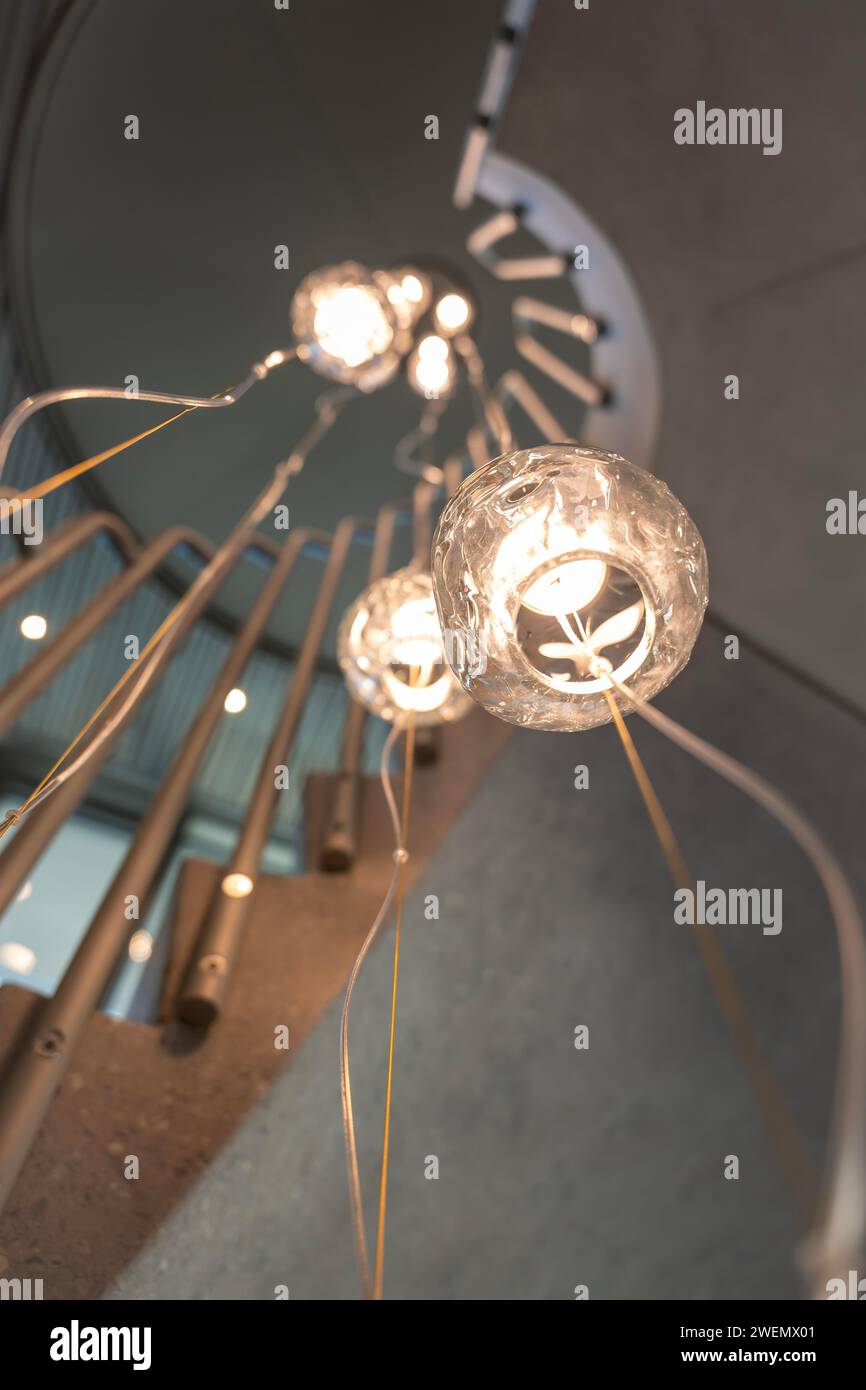 Modern Illuminated Hanging Lamp in Concrete Spiral Staircase with ...
