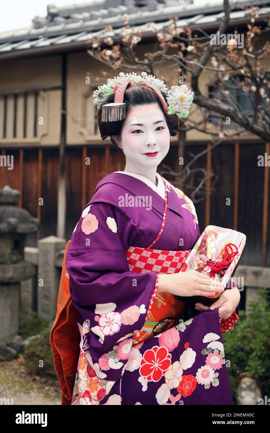 Beautiful Japanese Geisha Maiko in Kyoto, Japan with umbrella Stock ...