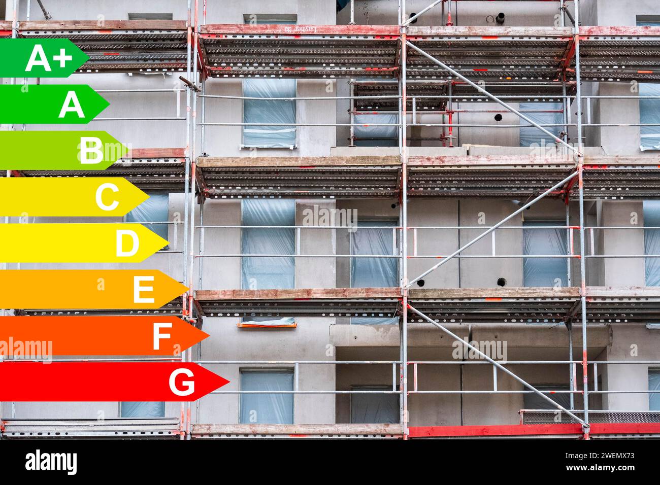 Scaffolding at the construction site of a new housing estate, graphic ...